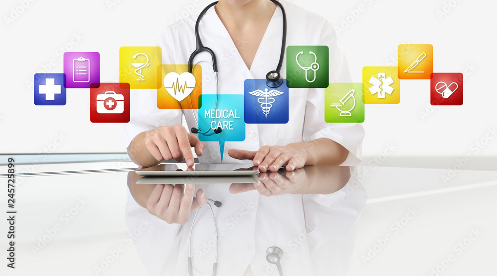 hands of doctor woman touch digital tablet at office desk with medical ...