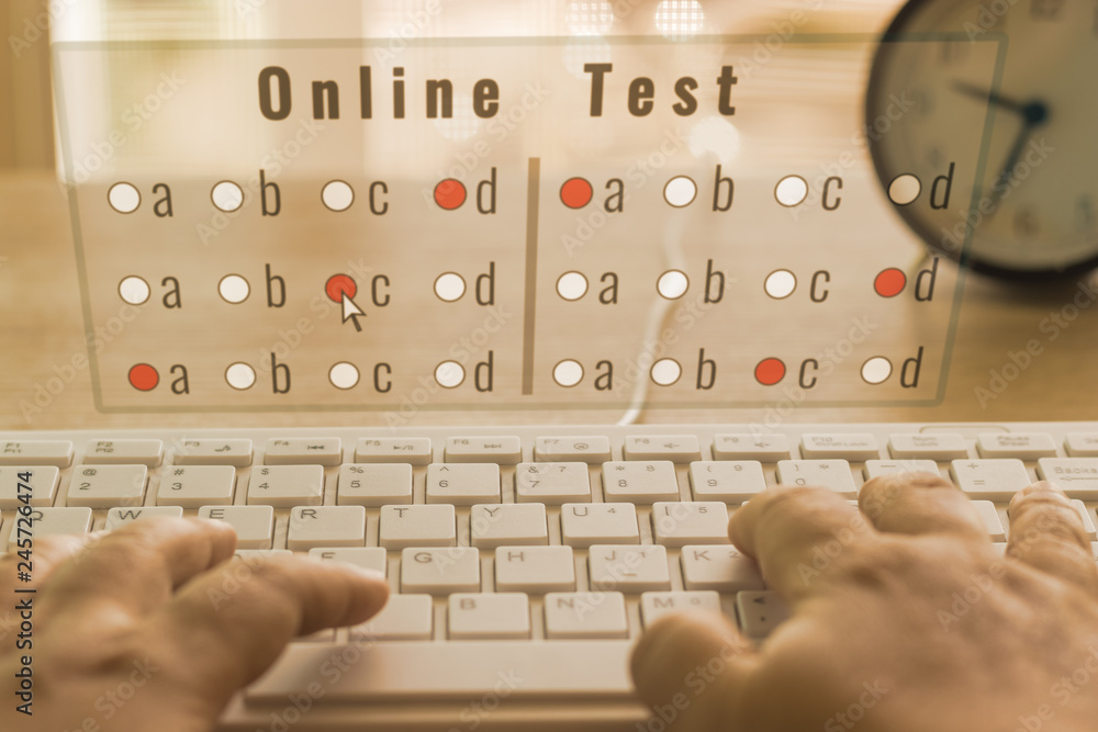 Dry hands of adult student is using mouse and white keyboard on wood ...