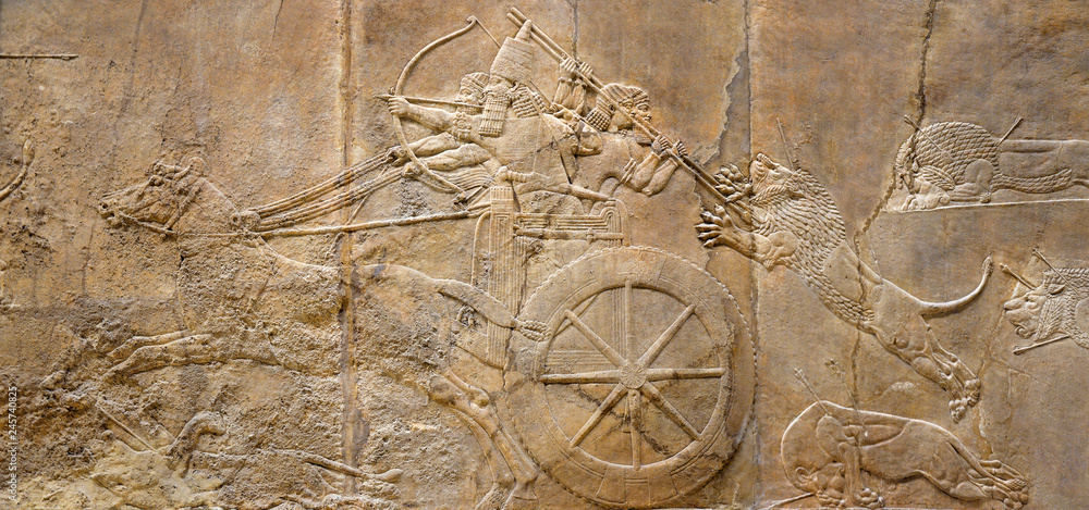 Plakat Assyrian relief of lions and warriors, ancient art of ...