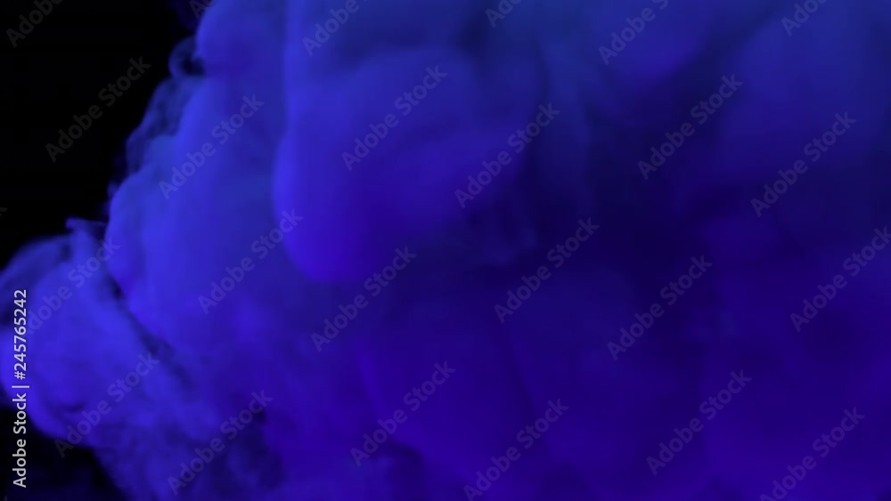 Vidéo Stock Colored smoke expanding towards the camera. Separated on ...