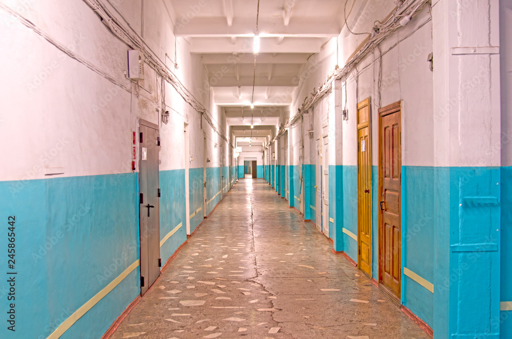 Poster A long corridor with doors to offices – Wall Art | UkPosters