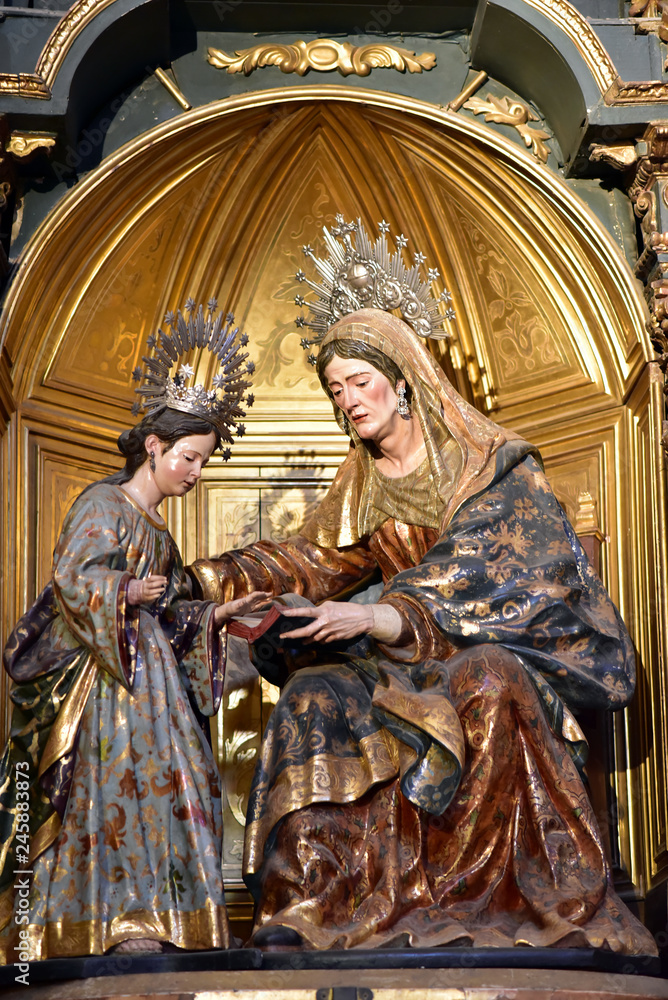 Poster A sculpture of Saint Anne teaching the Virgin Mary is displayed in the Divino Sa ...