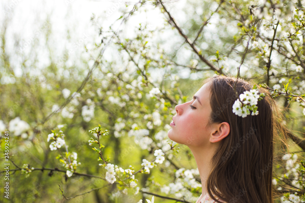 Summer girl with long hair. blossom. Spring woman. Springtime and ...