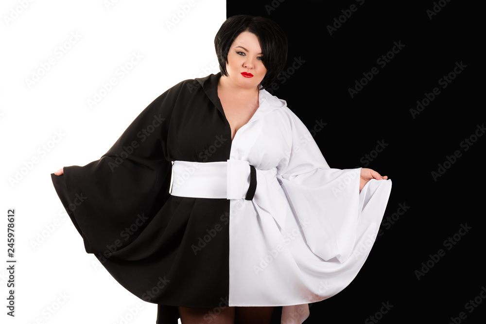 charming fat woman in beautiful black and white dress on black and ...