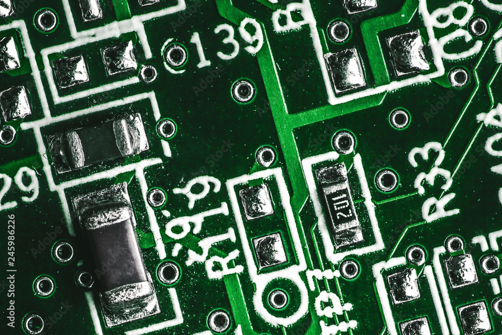 Green electronics technology background. Detailed circuit board texture ...