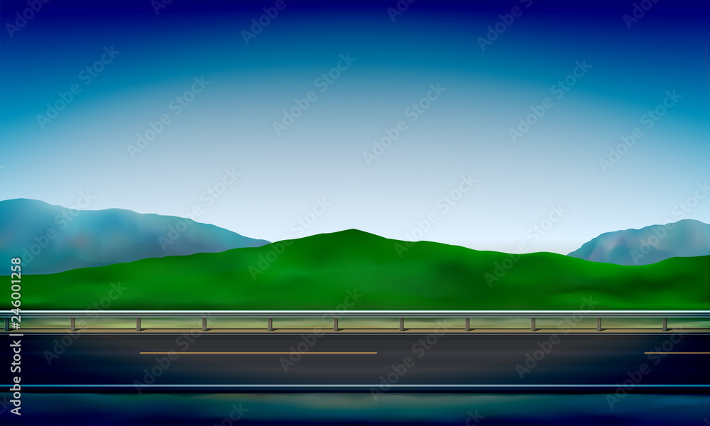 Side view of a road with a crash barrier, roadside, green meadow in the ...