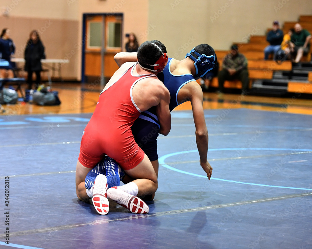 High School wrestlers competing at a wrestling meet. Stock Photo ...