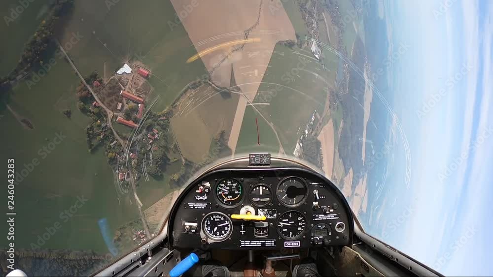 pilot's point of view in a sailplane's cockpit tilting left and then ...