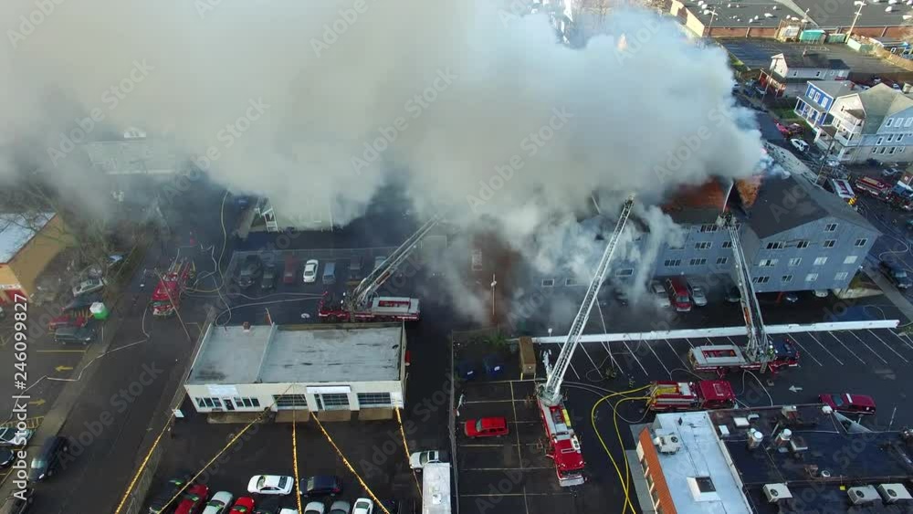Vidéo Stock High Angle Static Aerial View of Firetrucks Using Long ...