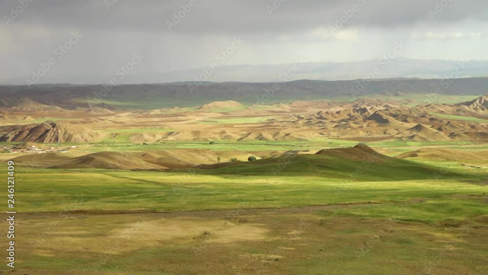 A beautiful landscape pan showing the Quru River valley, looking green ...