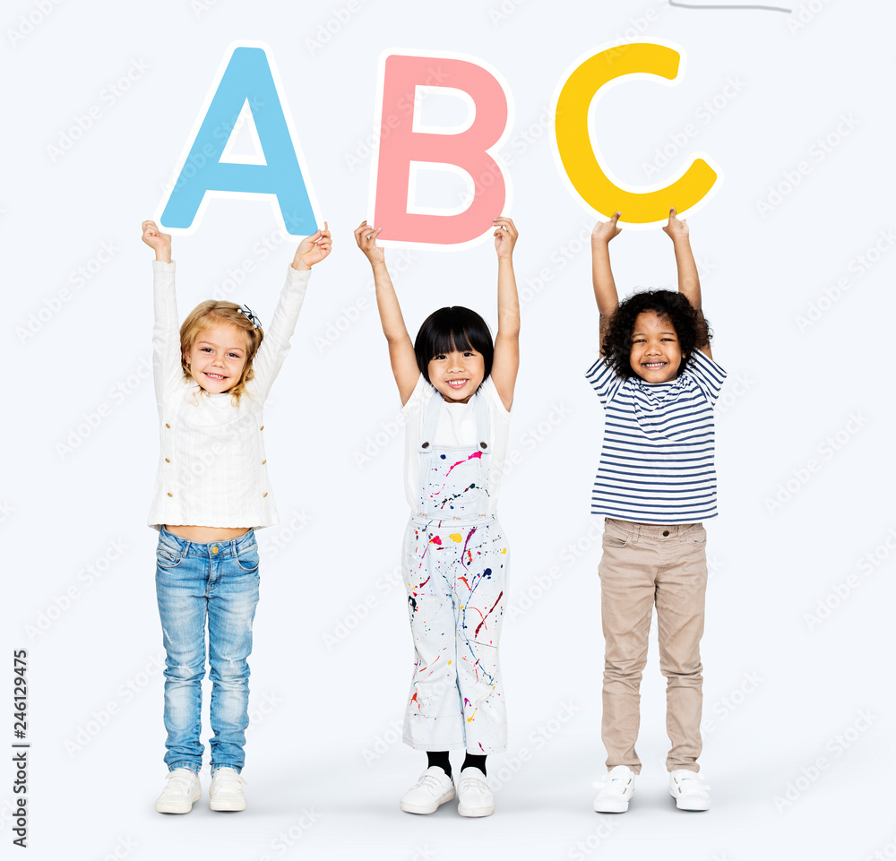 Diverse happy kids learning the ABC Stock Photo | Adobe Stock