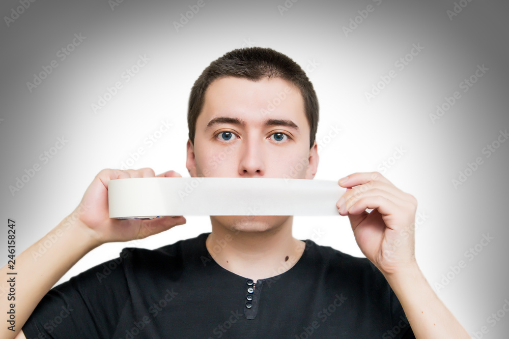 a young man taped his mouth shut with duct tape, a man with his mouth ...