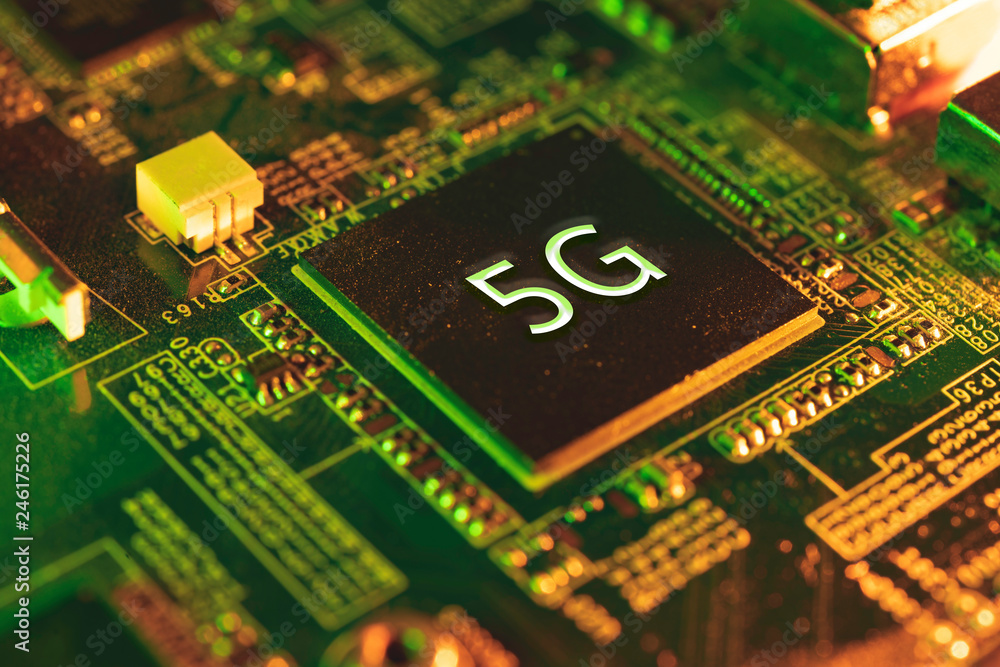 5g chip on motherboard with mixed artificial light. Communication ...