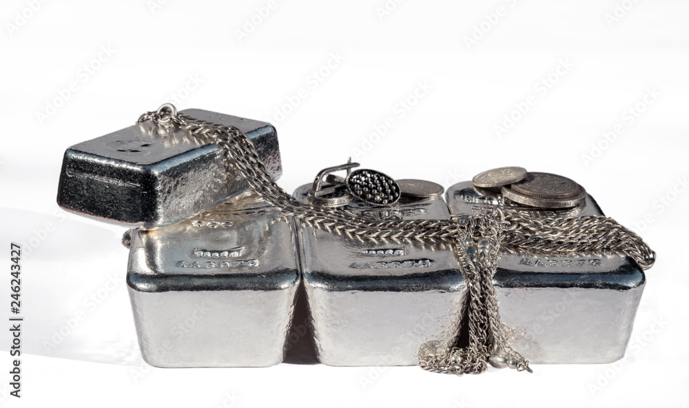 Silver bars, silver coins and jewelry. Isolated on white background ...