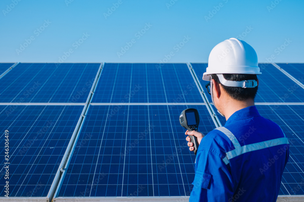 engineer using thermal imager to check temperature heat of solar panel ...