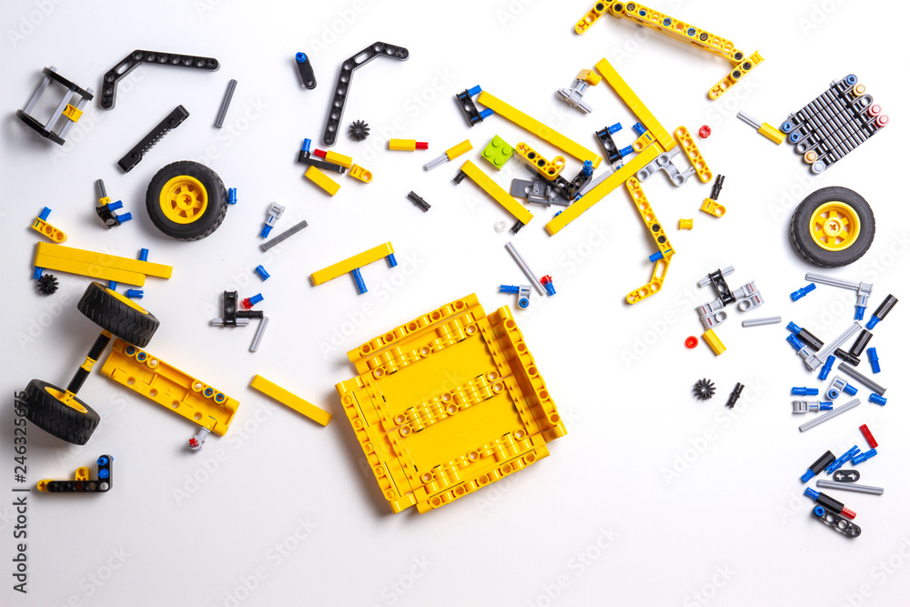 Robot car constructor details on white table. Robotic, learning ...