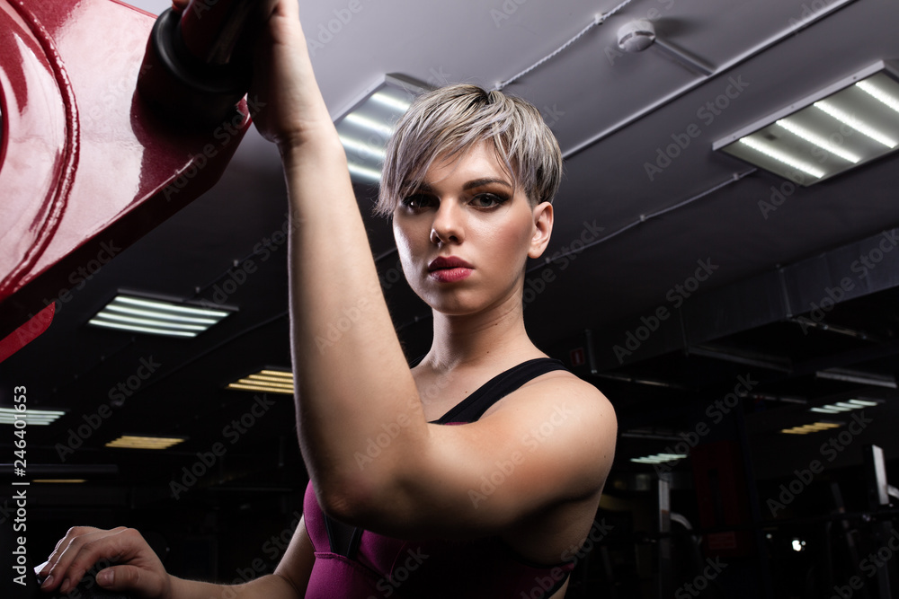 Beautiful fitness model girl posing wearing sport clothes. Girl in the ...