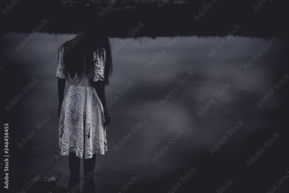 Portrait of asian woman make up ghost face at the swamp,Horror scene ...