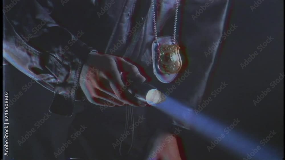 A cop from the past looking around with a flashlight and his police ...