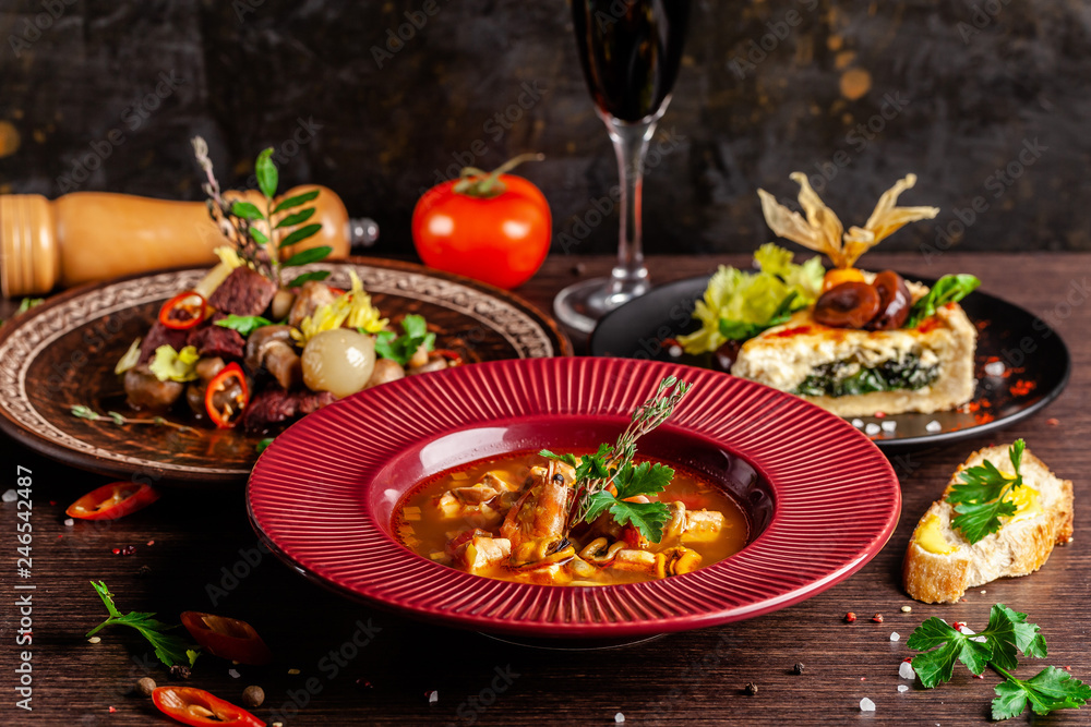 Concept of French cuisine. Laid table in a restaurant for a celebration ...