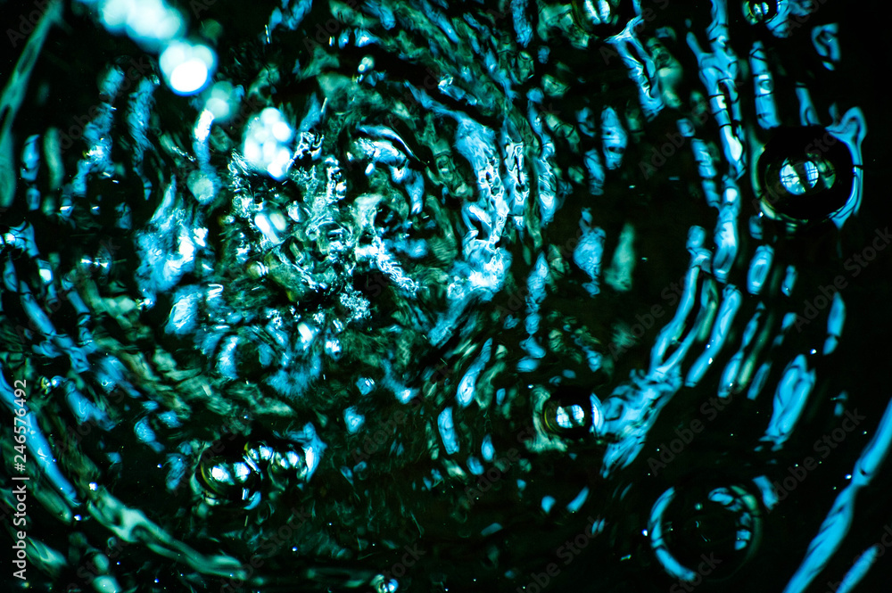 Macro shot of abstract, blurred, blue water background. Water flow and ...