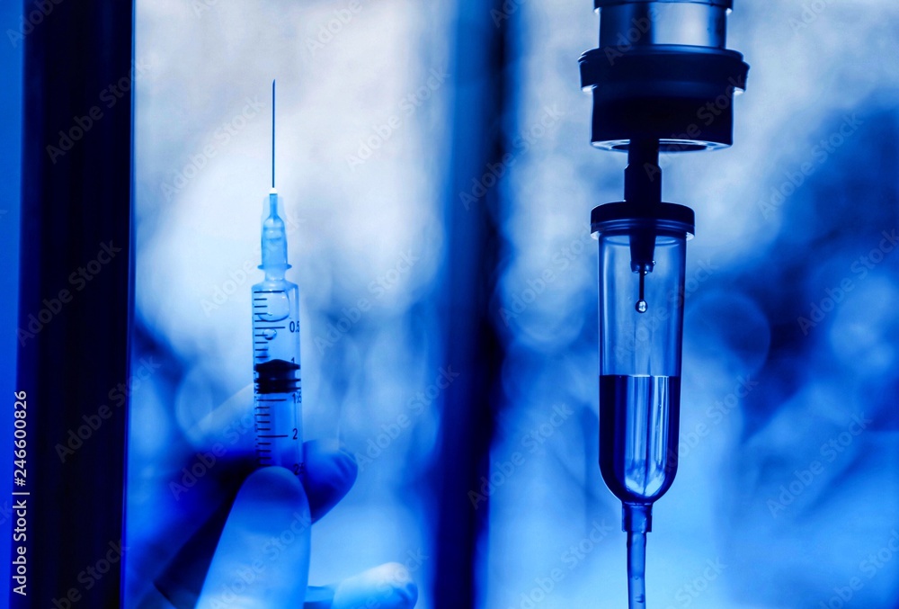 Chemotherapy drug medical holding hypodermic syringe needle injection ...