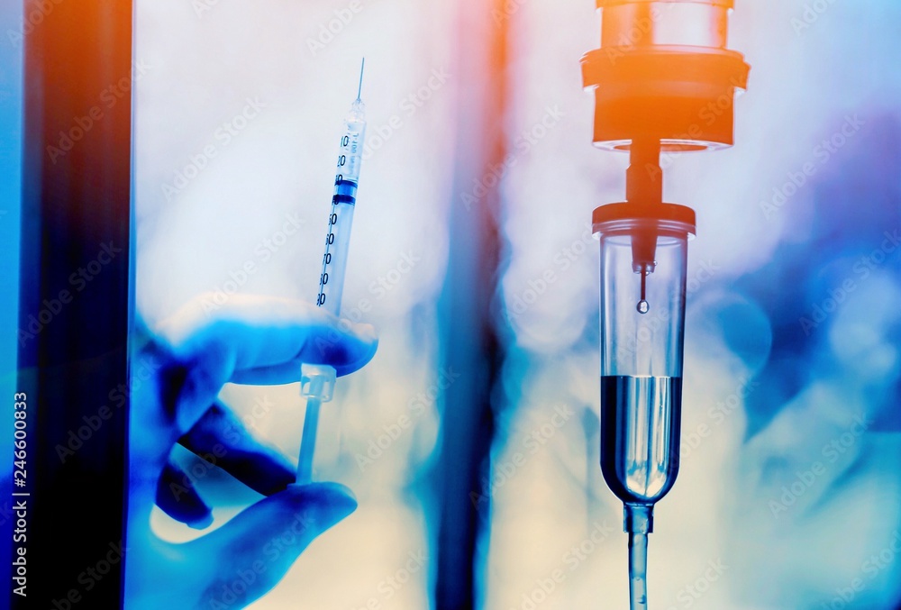 Chemotherapy drug medical holding hypodermic syringe needle injection ...