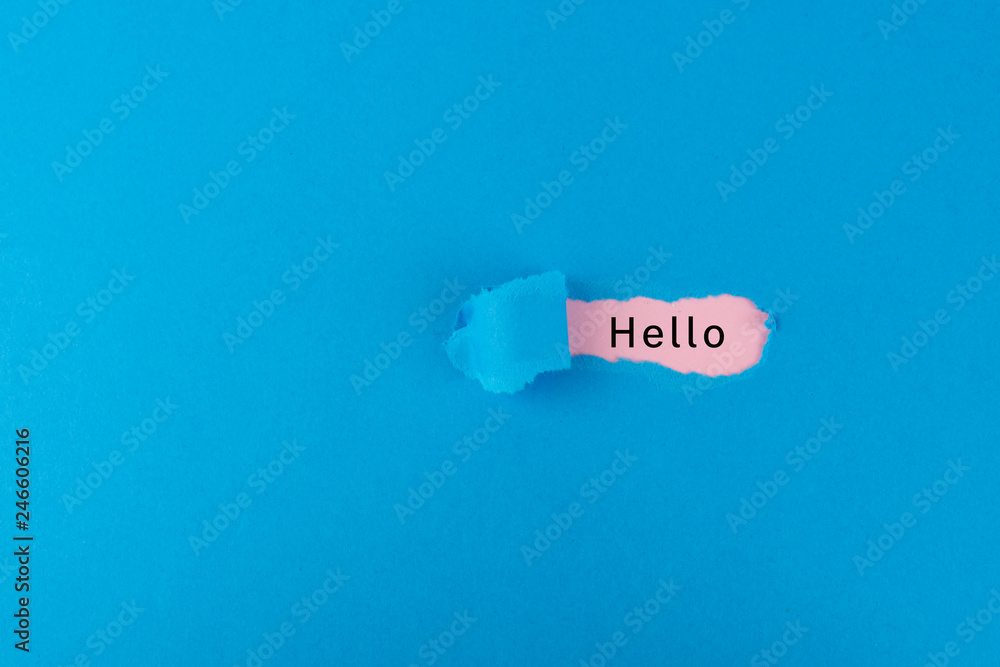 Torn paper with the word hello underneath Stock Photo | Adobe Stock