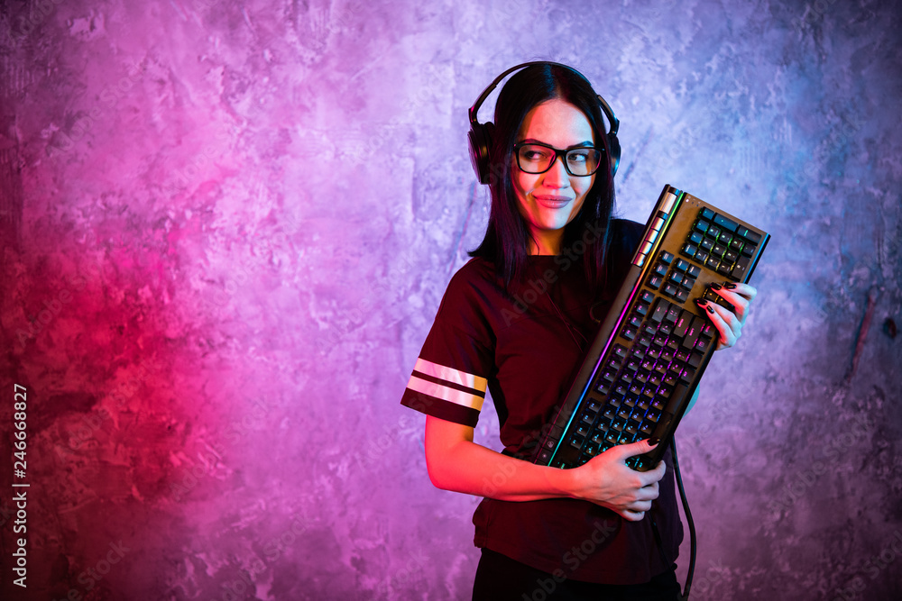 Professional Girl Gamer in MMORPG Strategy Video Game. She's She posing ...