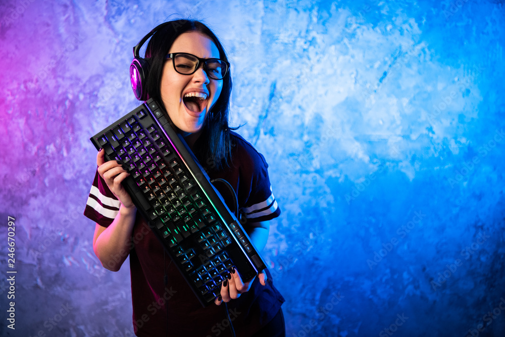 Beautiful Friendly Pro Gamer Streamer Girl Posing With a Keyboard in ...