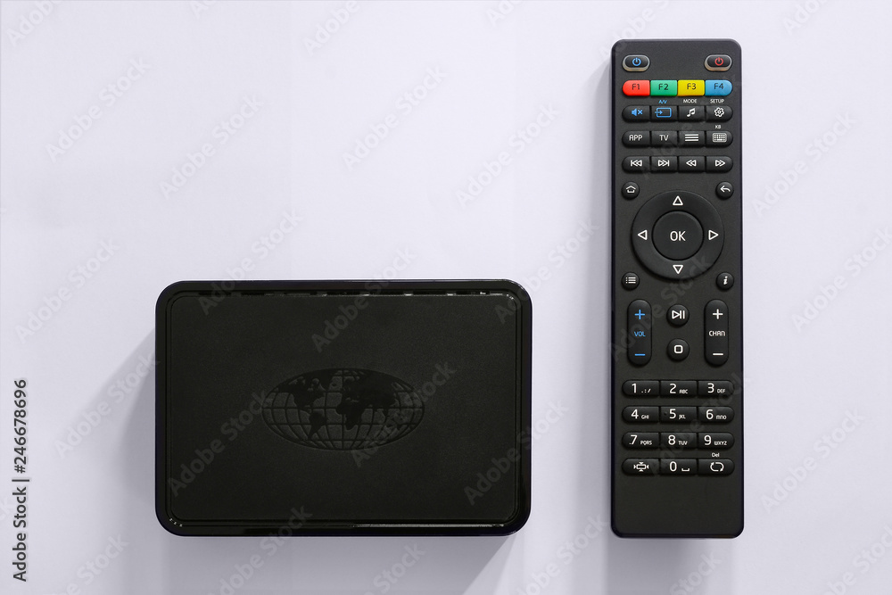Iptv box and remote controller. Modern multimedia device for viewing ...