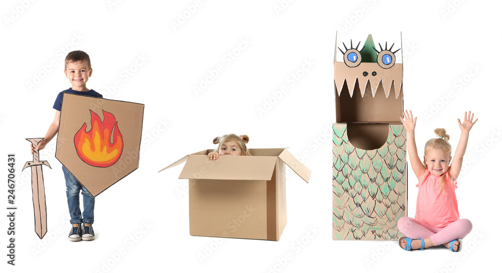 Little cute children playing with cardboard boxes on white background ...