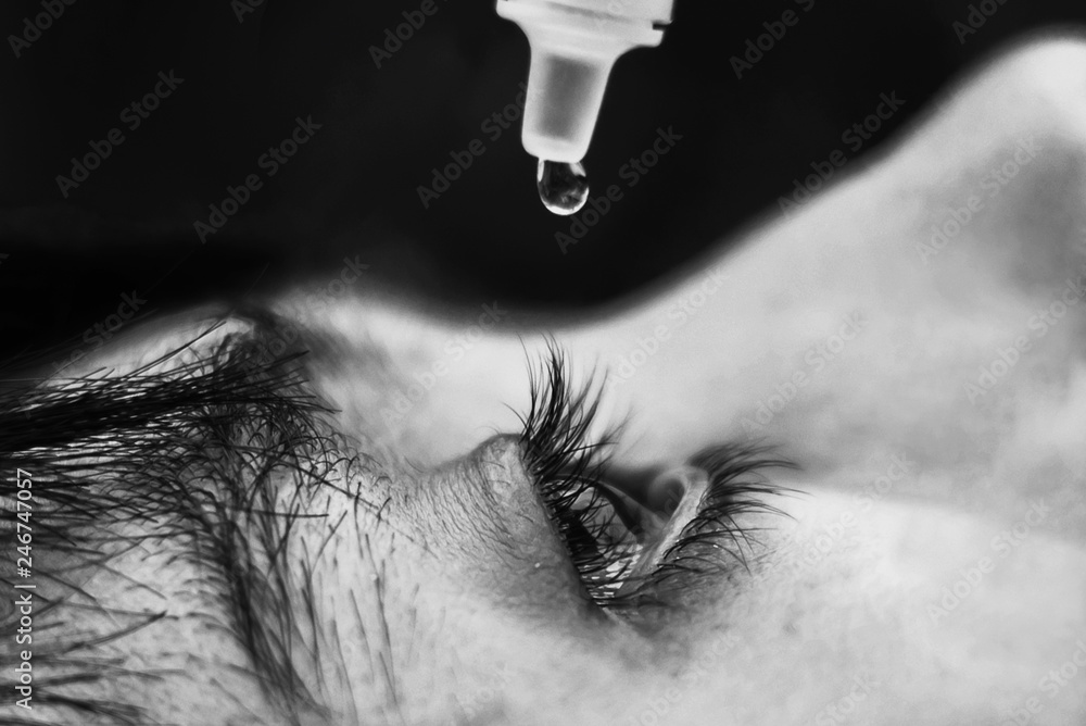 Boy dropping eye drop medicine healing his eye pain, health care eye ...