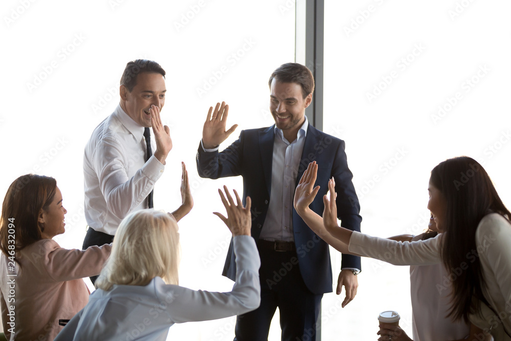 Excited diverse employees motivated happy executive office workers ...