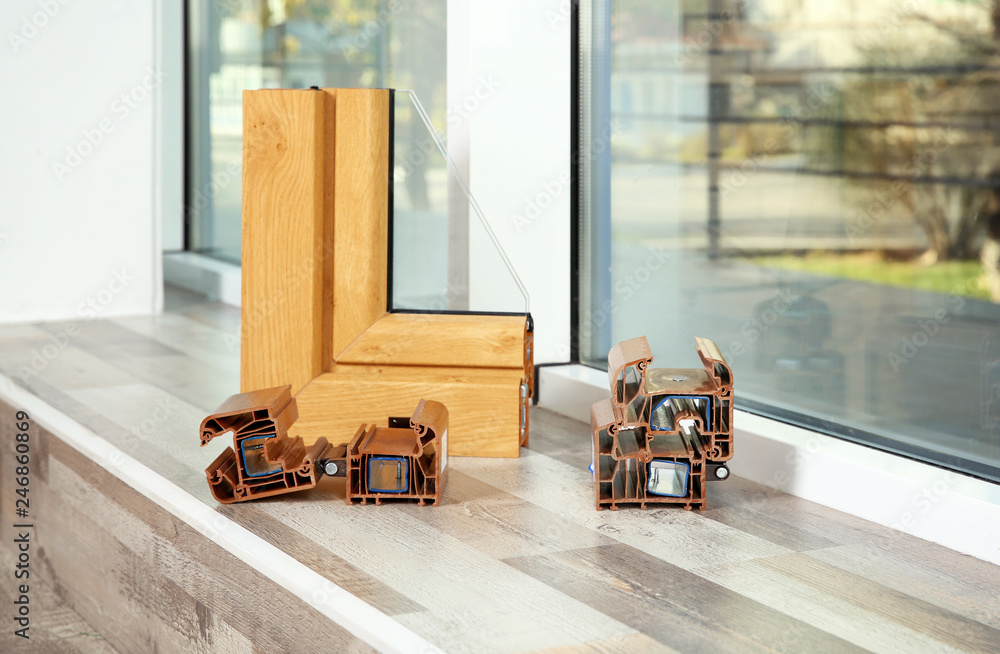 Sample of modern window profile on sill indoors. Installation service ...