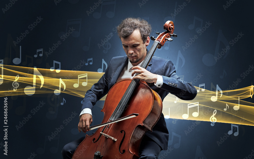 Young male musician playing on his cello with musical notes around ...