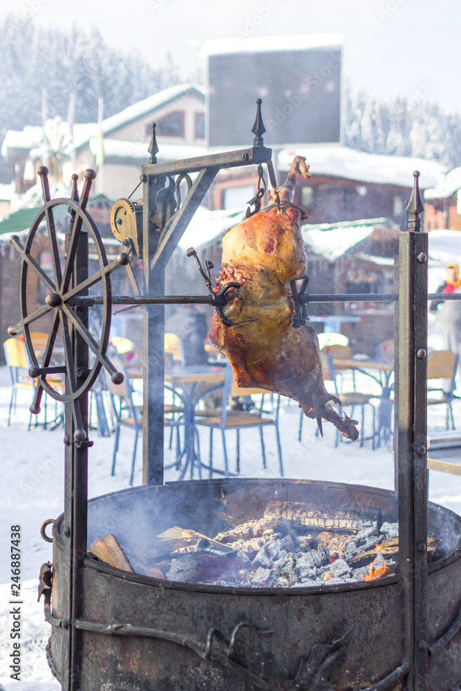 Street food. Spit-roasted meat. Traditional Caucasian cuisine. Lamb ...