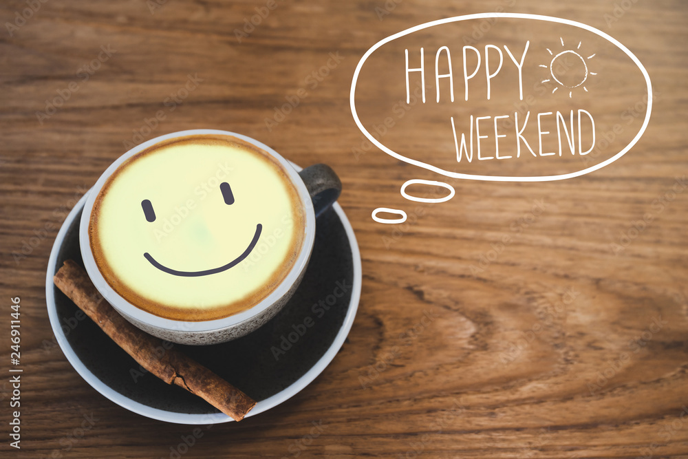 Inspirational quote "Happy Weekend"on smiling face on coffee cup ...