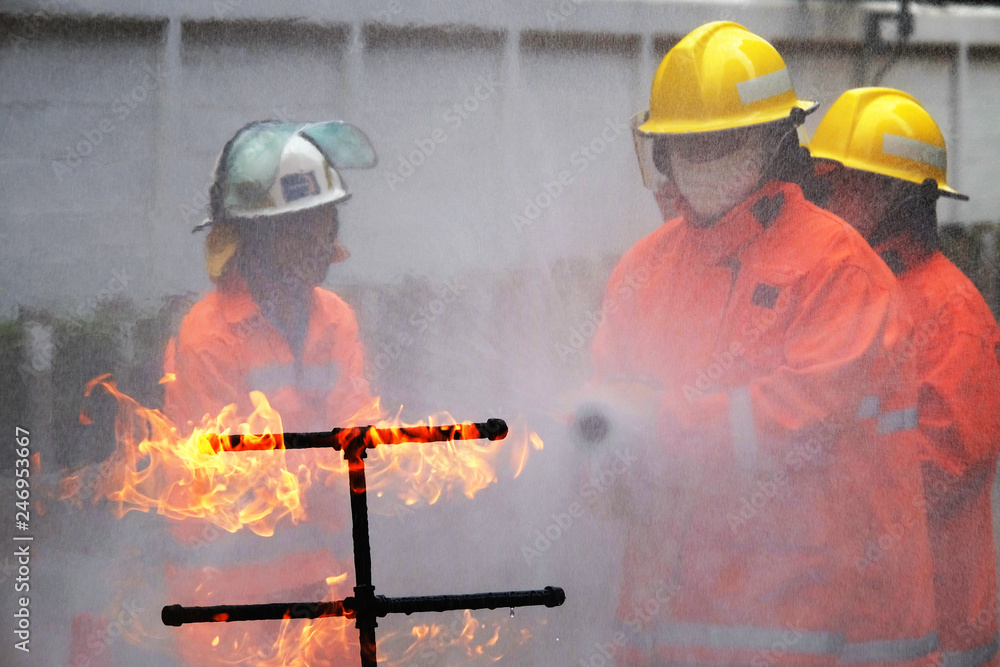 Scary fire brigade demonstrative prepared at a fire drill with ...