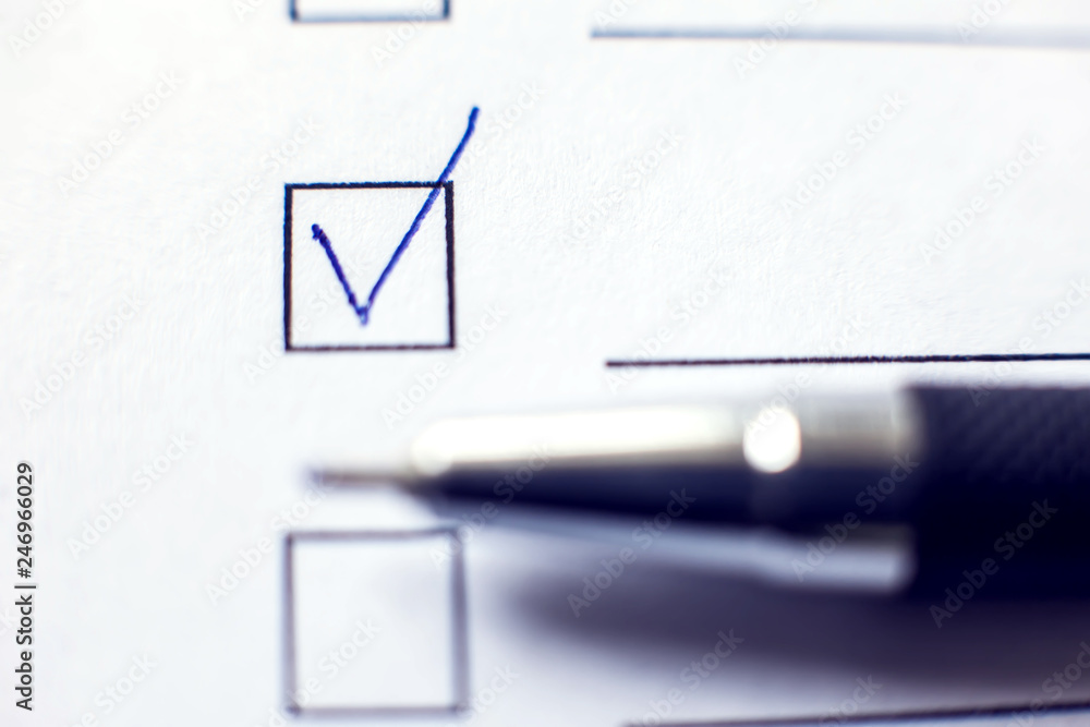 Checklist form with a pen on white paper. Checkbox concept. Stock Photo ...