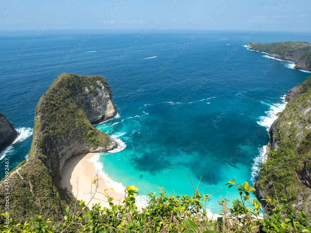 Magnificent landscape of the Kelingking beach peninsula shaped like a ...