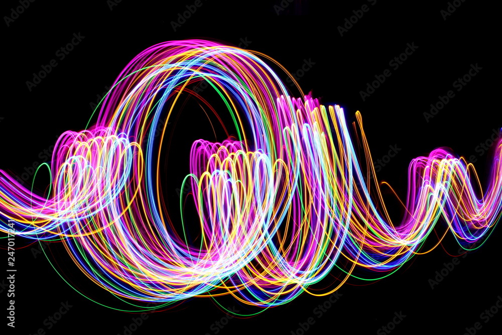 Pink and multi color light painting photography, gold, pink, green and ...