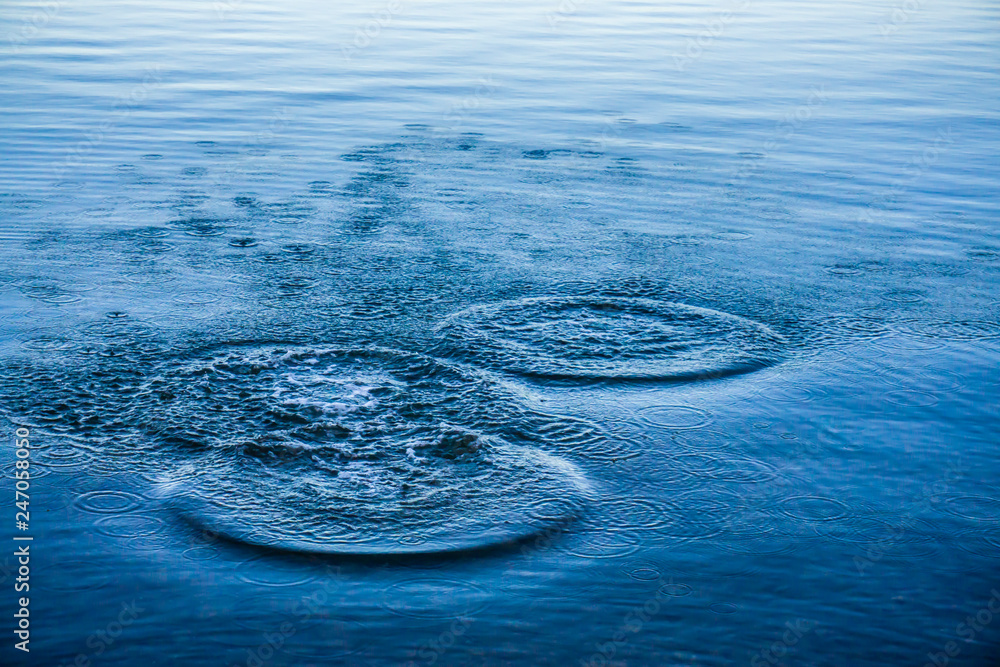 Ripples on sea texture pattern background. Round droplets of water over ...