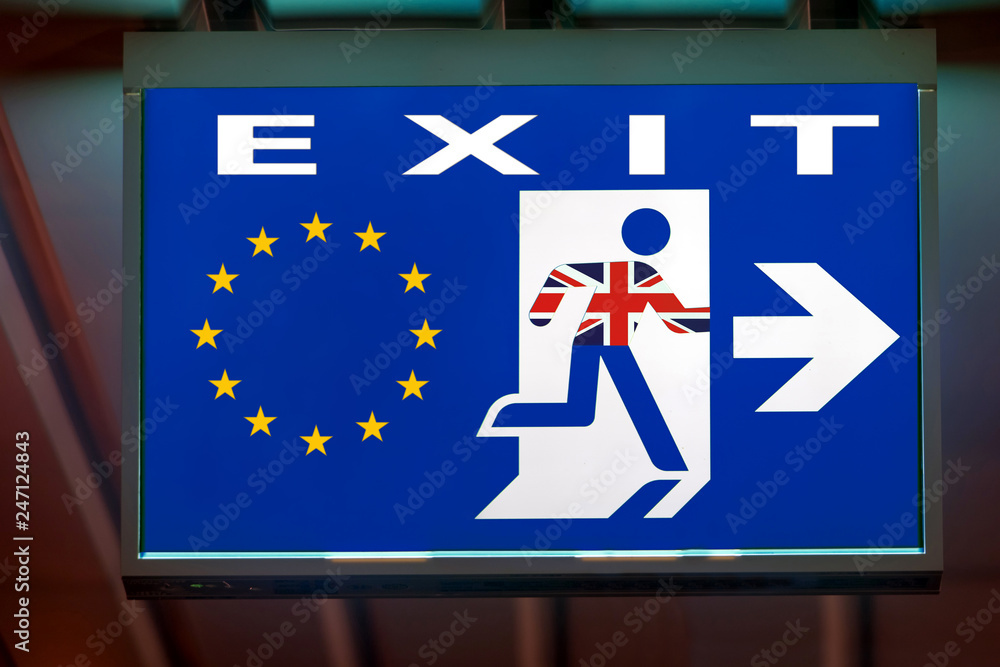 The emergency exit sign shows the direction of escape in case leave ...