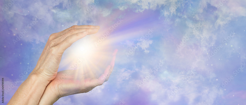 Sending Beautiful Healing Light across distance - female hands cupped ...