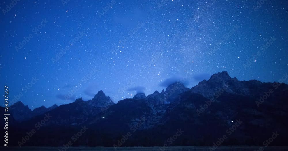 A time lapse of stars over the Teton Range in Grand Teton National Park ...