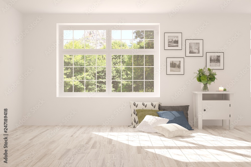White stylish empty room with summer landscape in window. Scandinavian ...