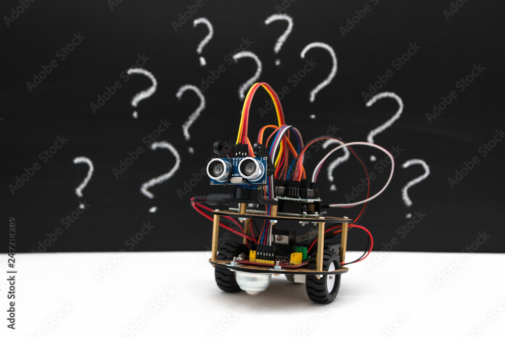 Hand made robot working on the arduino platform. White background. Free ...