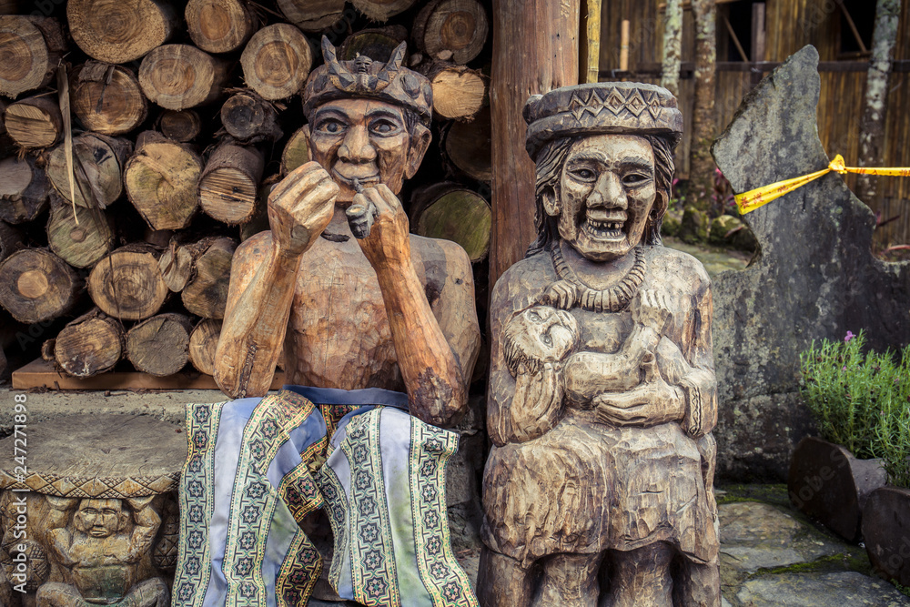Indigenous wooden statues at Formosan Aboriginal Culture Village. Stock ...