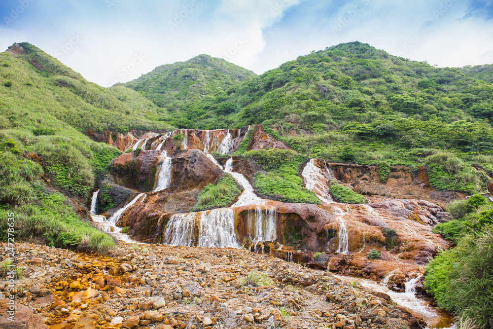 The Golden Waterfall is a waterfall near the popular tourist village ...